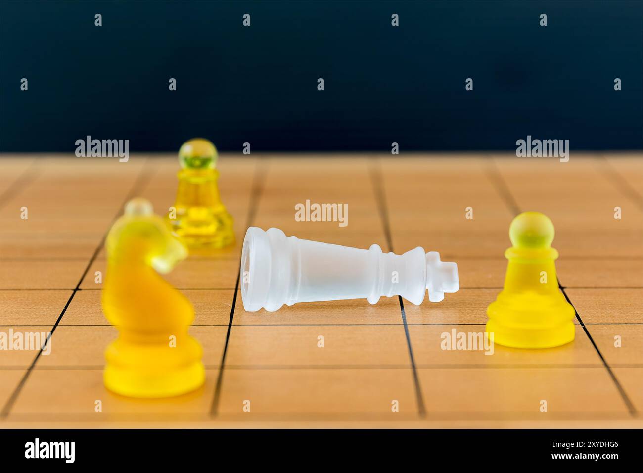 Close up chess pieces on a wood chessboard Stock Photo - Alamy