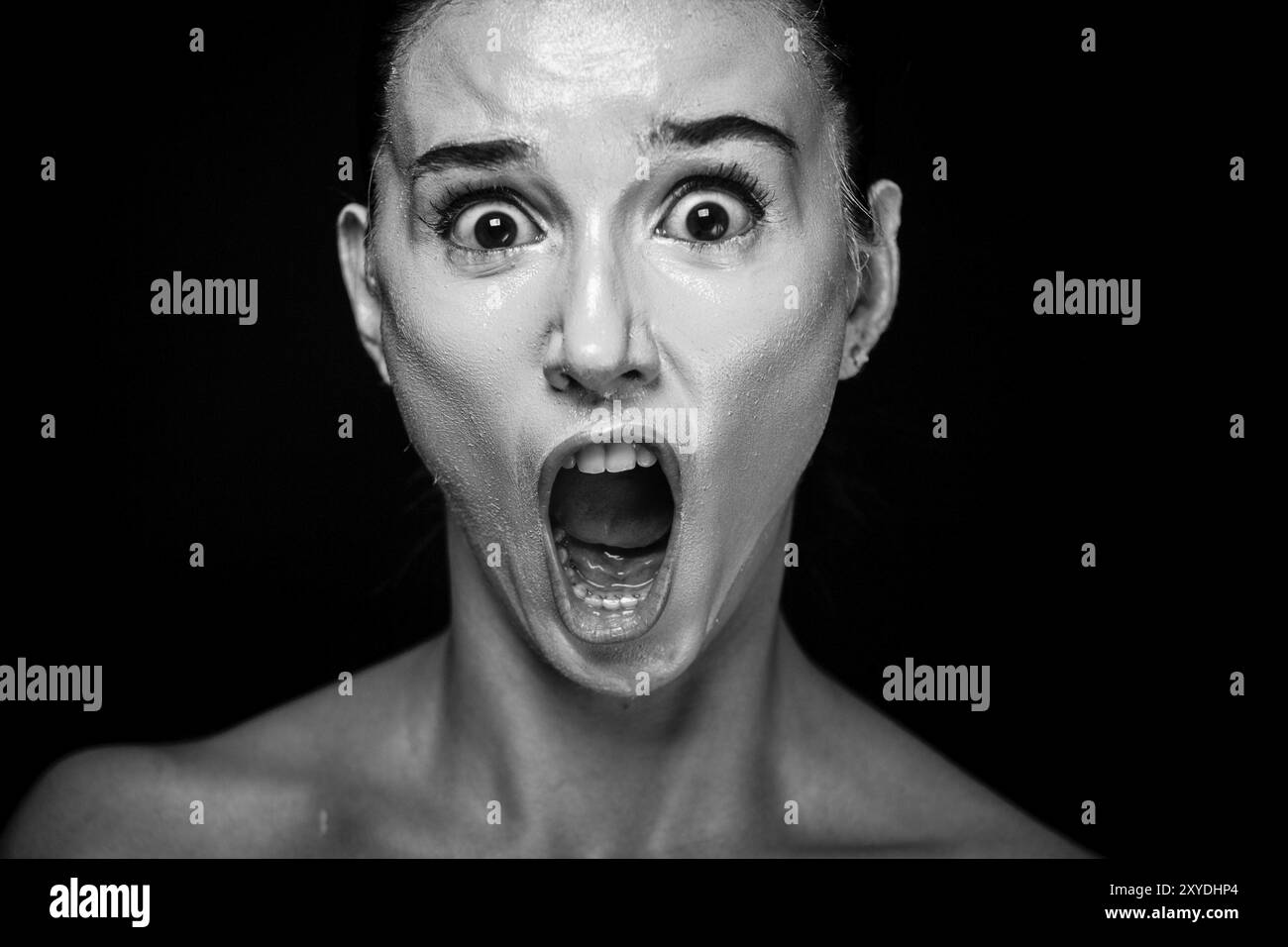 Horror Scene of a Woman Screaming on black background Stock Photo - Alamy