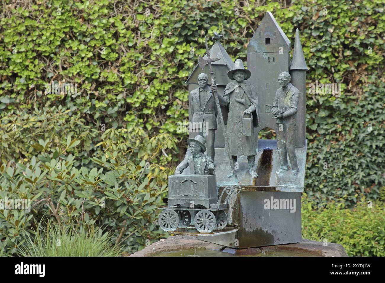 Historian's fountain with figures on the town's history, four ...