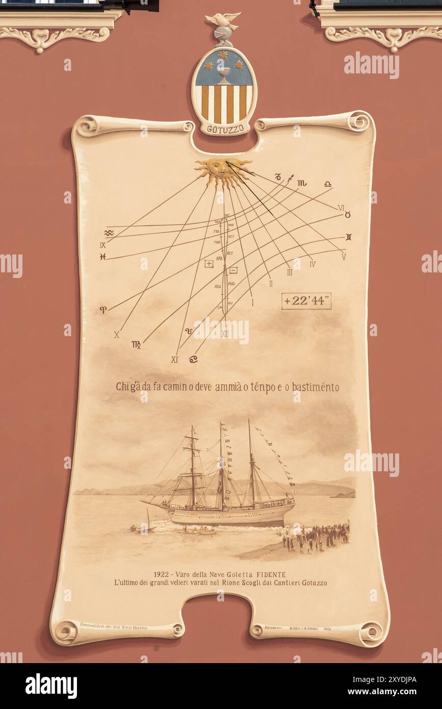 Sundial on the facade of an ancient house in the center of Chiavari ...