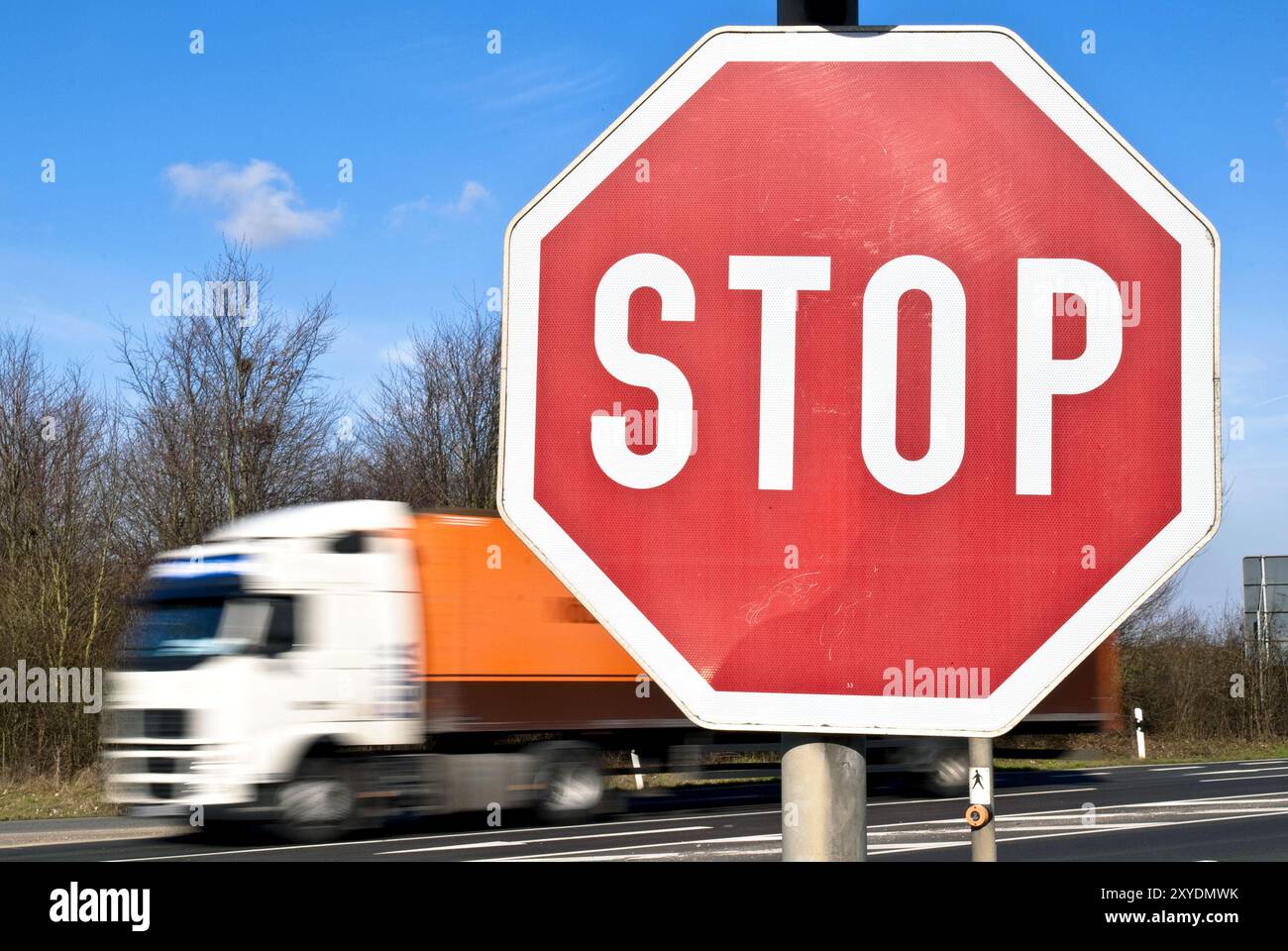 Lorry and stop sign Stock Photo - Alamy