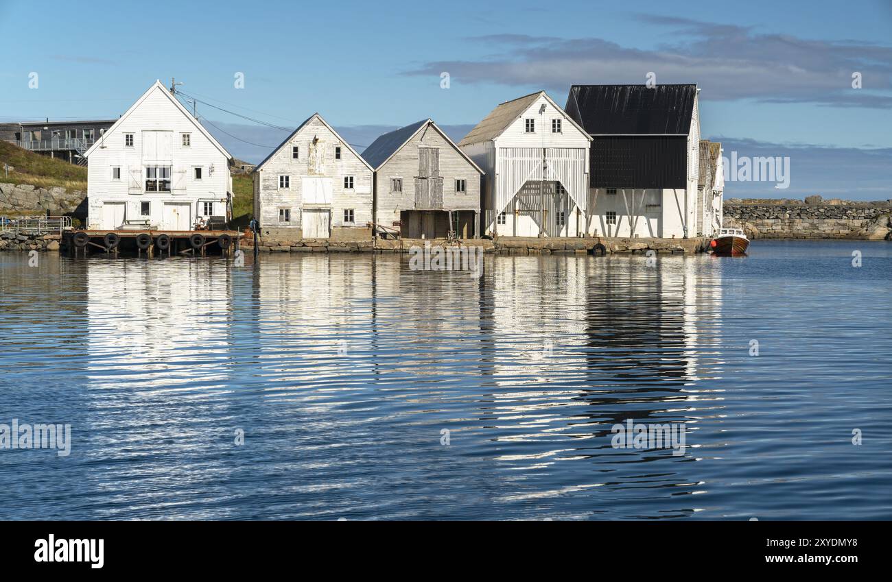 Old warehouses in Runde Island harbour, More og Romsdal, Norway, Europe ...
