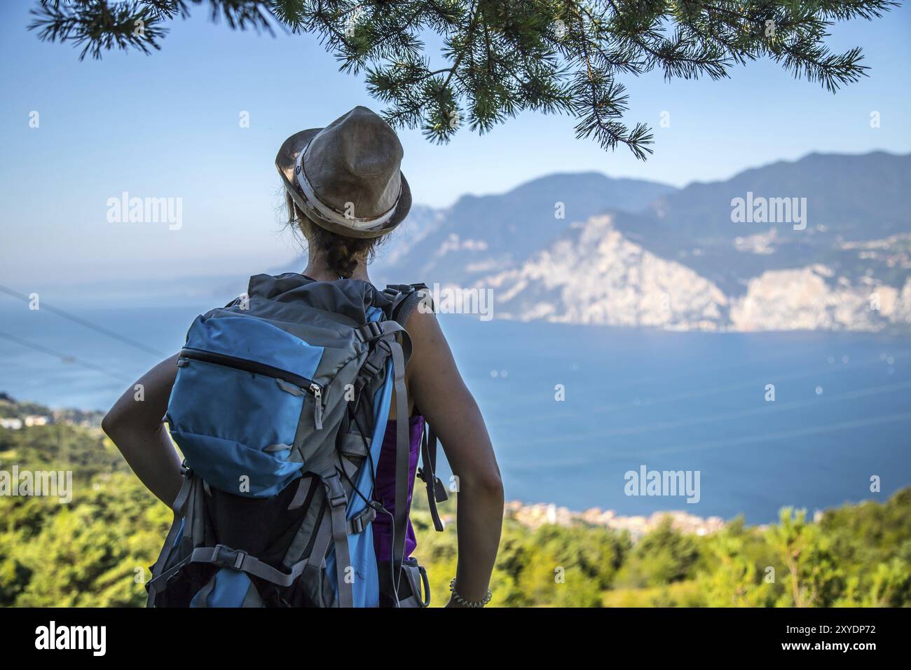 Hiking in Italy: Girl with straw hat is enjoying the view, summertime ...