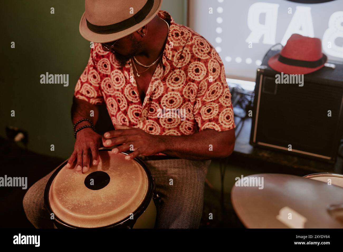 Black man playing conga african hi-res stock photography and images - Alamy