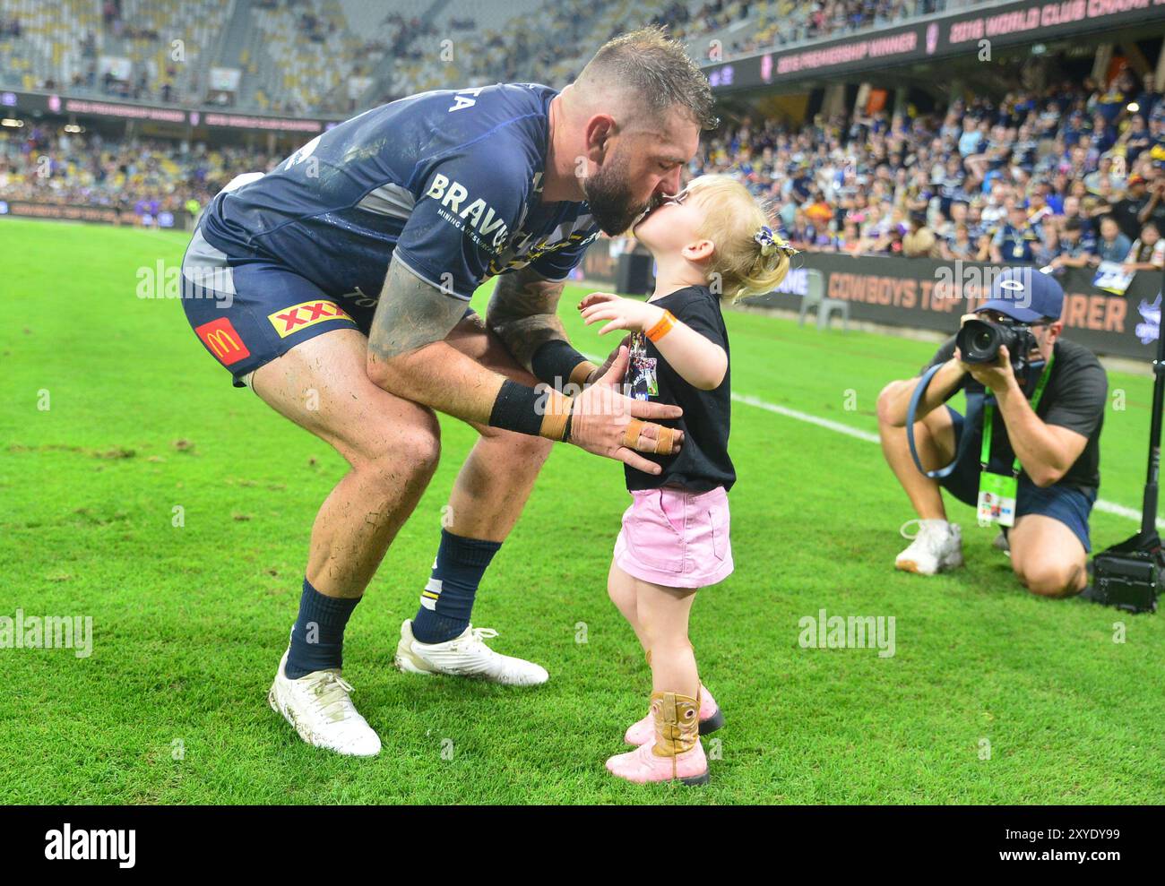 Kyle Feldt of the Cowboys with daughter Macie following the NRL Round ...