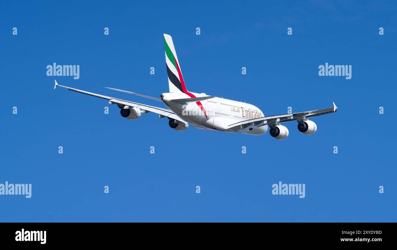 Emirates Airlines Airbus A380 departing above into a clear blue sky ...
