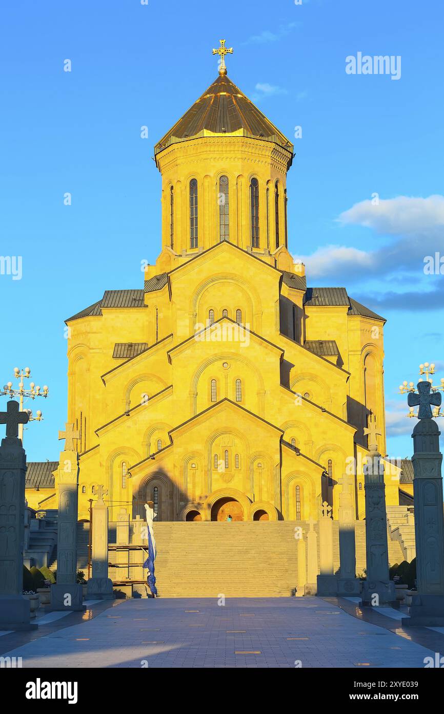 Holy Trinity church or Tsminda Sameba Cathedral closeup sunset vertical ...