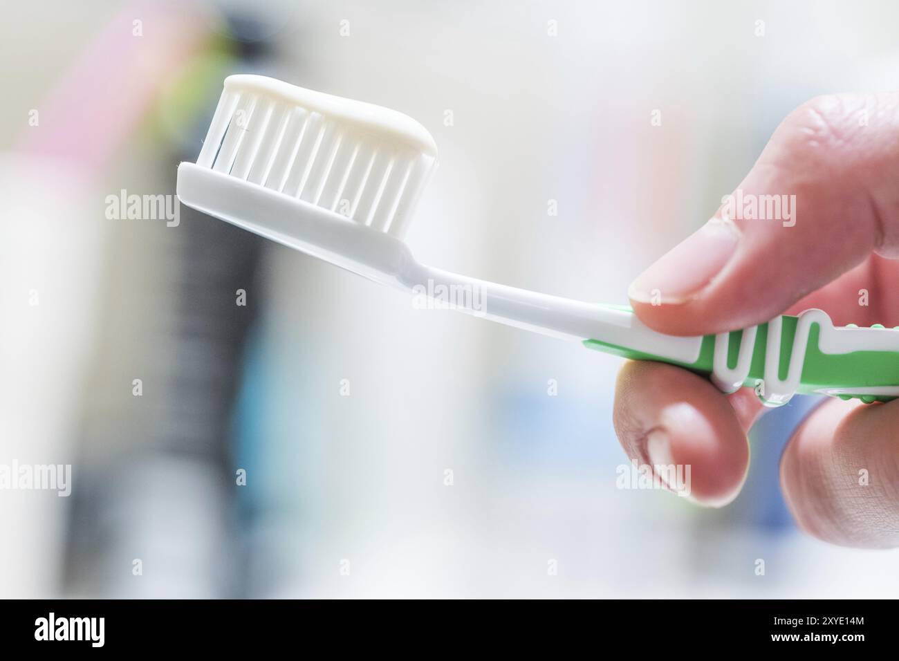 Colorful toothbrush in the bathroom, morning routine Stock Photo - Alamy