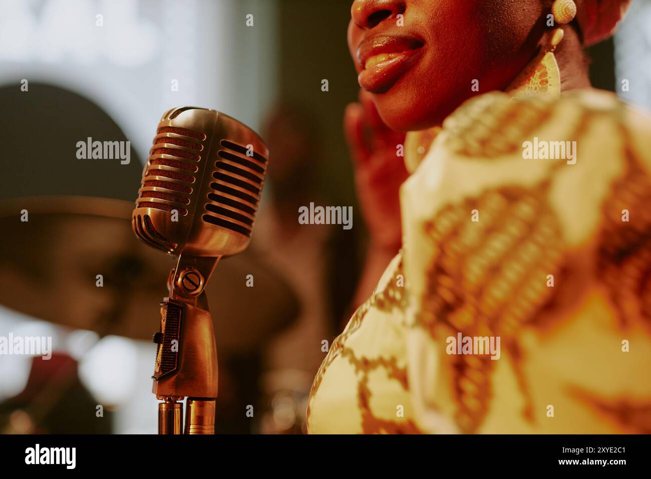 Young Black Singer With Microphone Stock Photo - Alamy