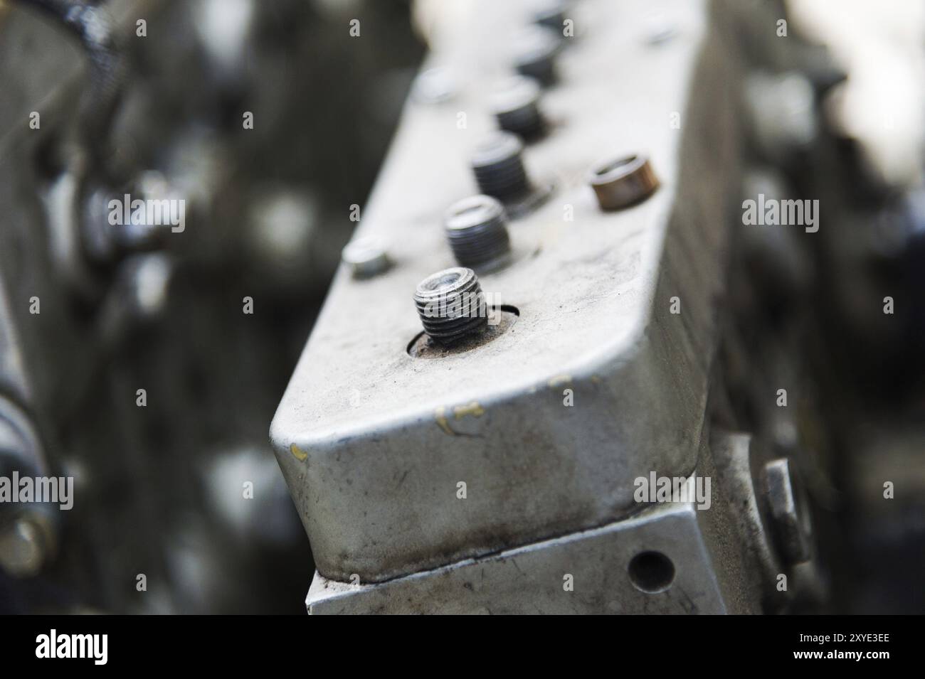 A close-up of an old mechanical high-pressure diesel pump. The shallow ...