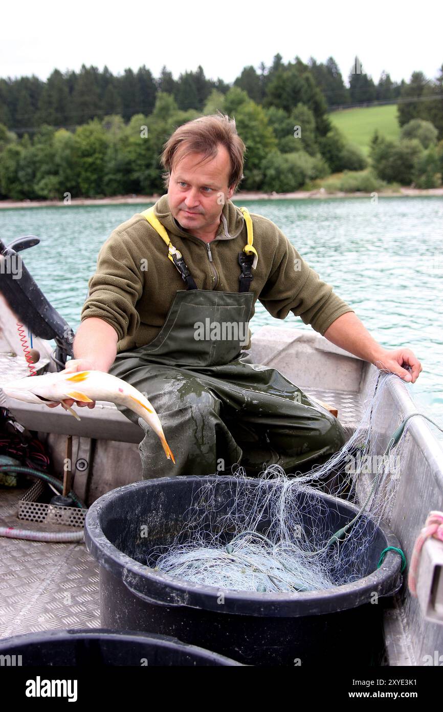 Fishermen take boats out hi-res stock photography and images - Alamy