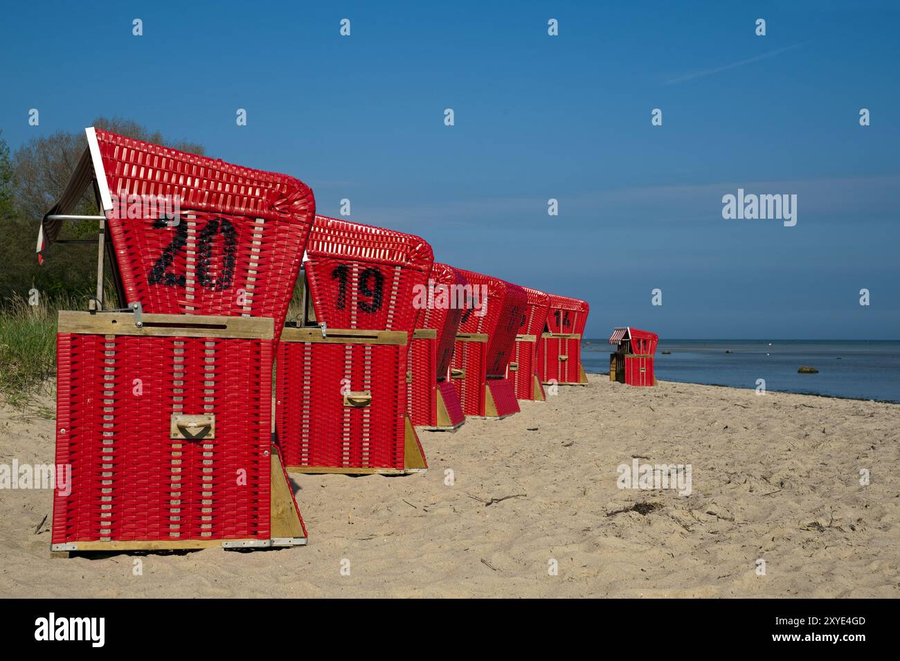 Row chairs one red hi-res stock photography and images - Alamy