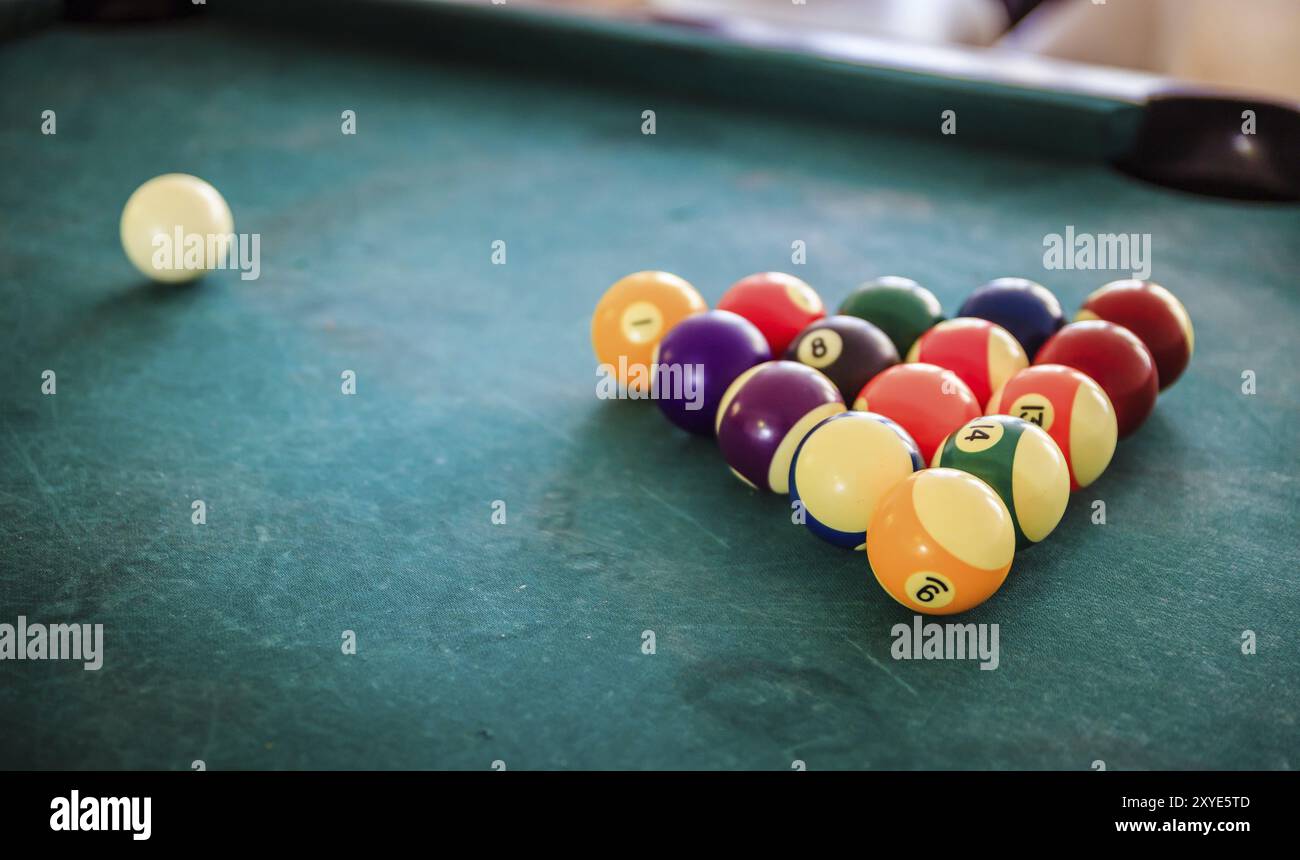 Billard balls and table in a bar Stock Photo - Alamy