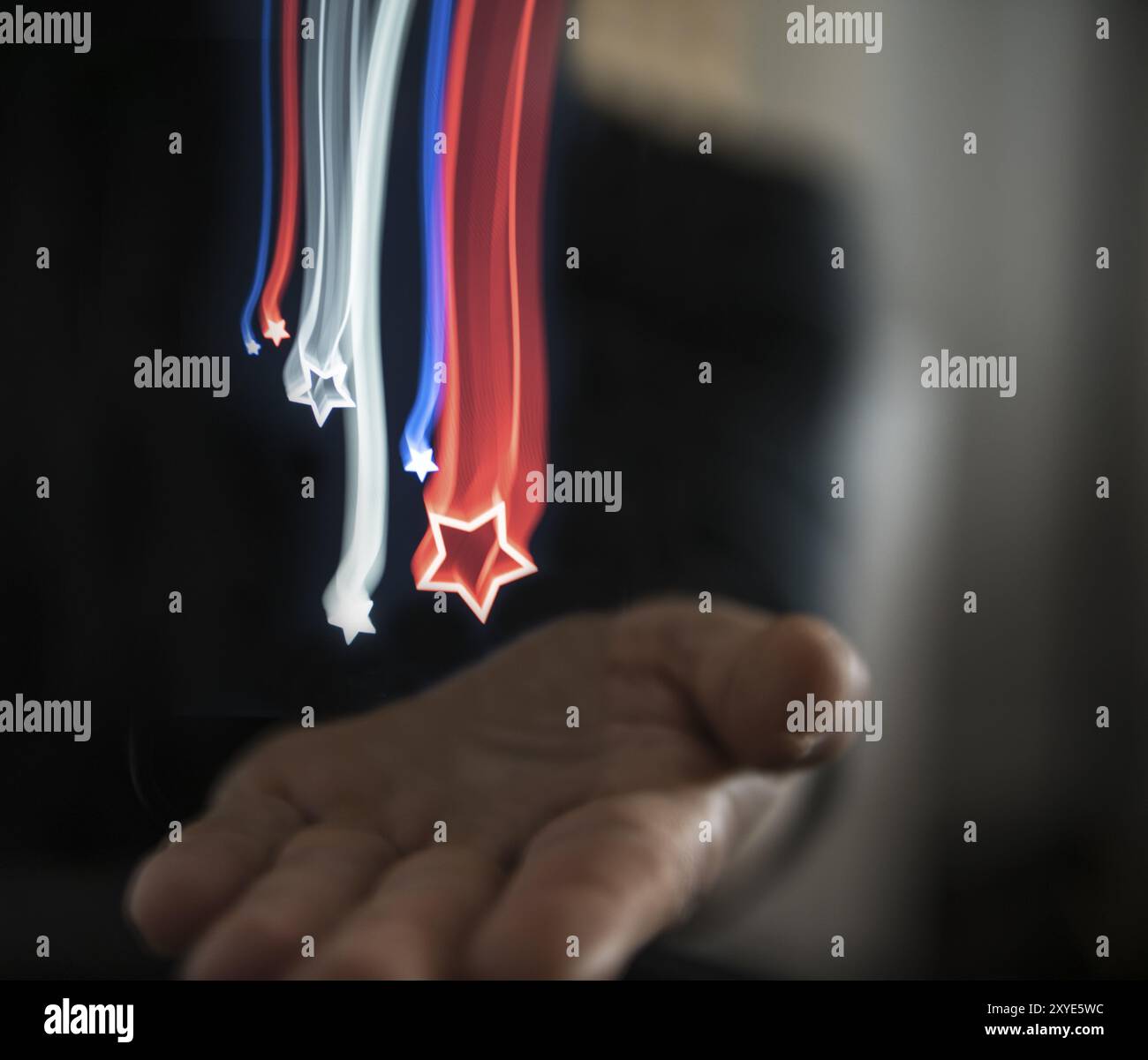 Shooting star hand Stock Photo - Alamy