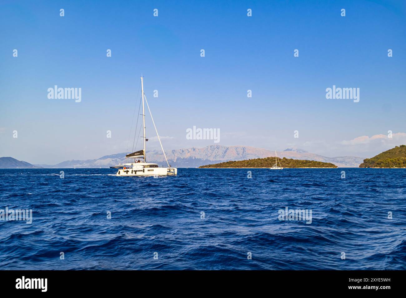 blue horizons boat travel Stock Photo - Alamy