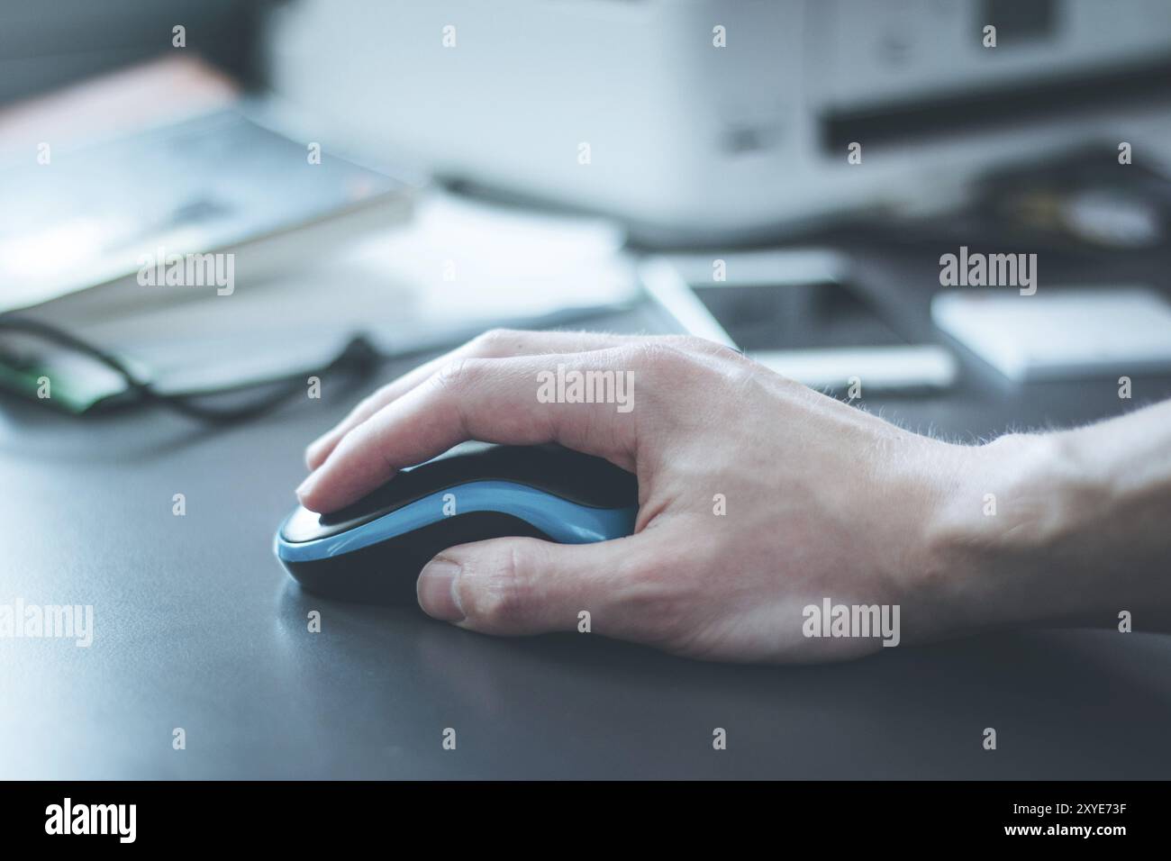 Close up of computer mouse used by a male hand Stock Photo - Alamy
