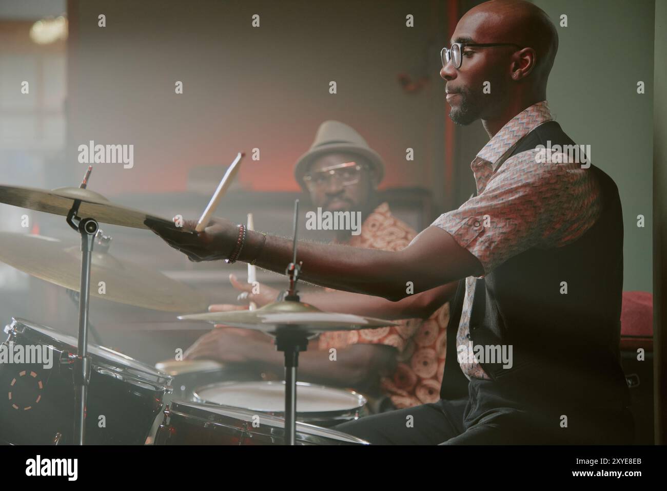 Adjusting drum hi-res stock photography and images - Alamy