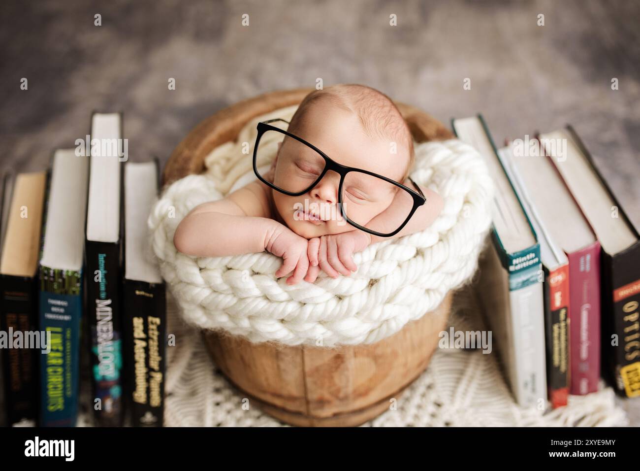 Newborn baby boy with glasses, smart baby Stock Photo - Alamy