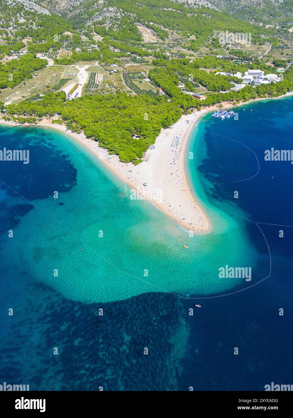 Aerial shot over stunning Zlatni Rat Beach in Bol, Croatia Stock Photo ...