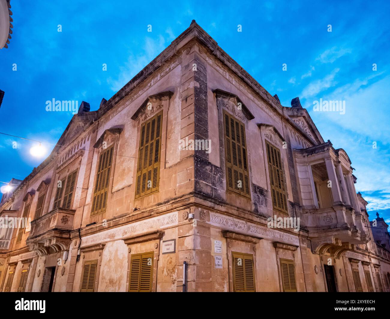 The photo captures an antique building with detailed facades and ...