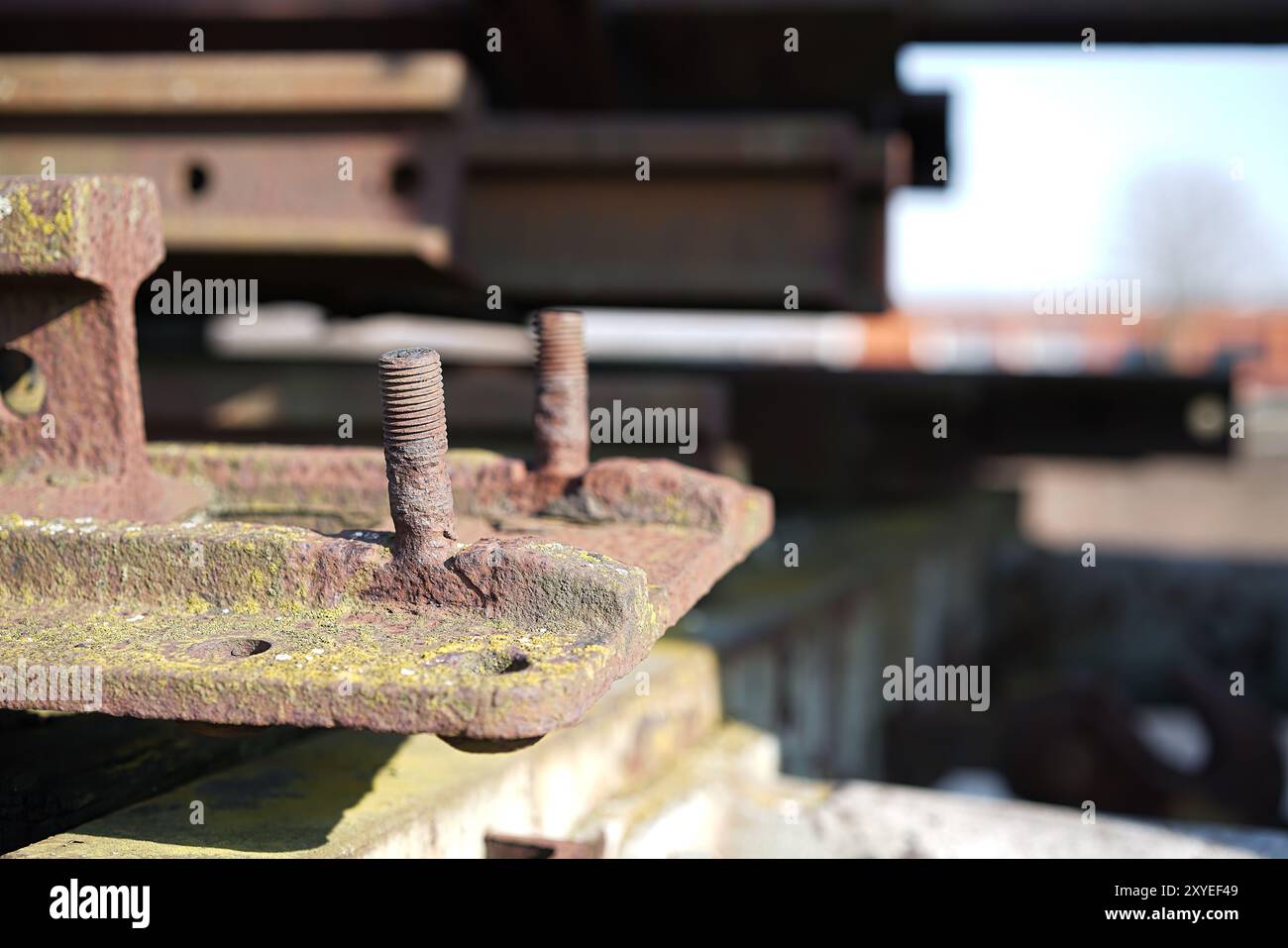Rusted component with screws in a scrapyard Stock Photo - Alamy