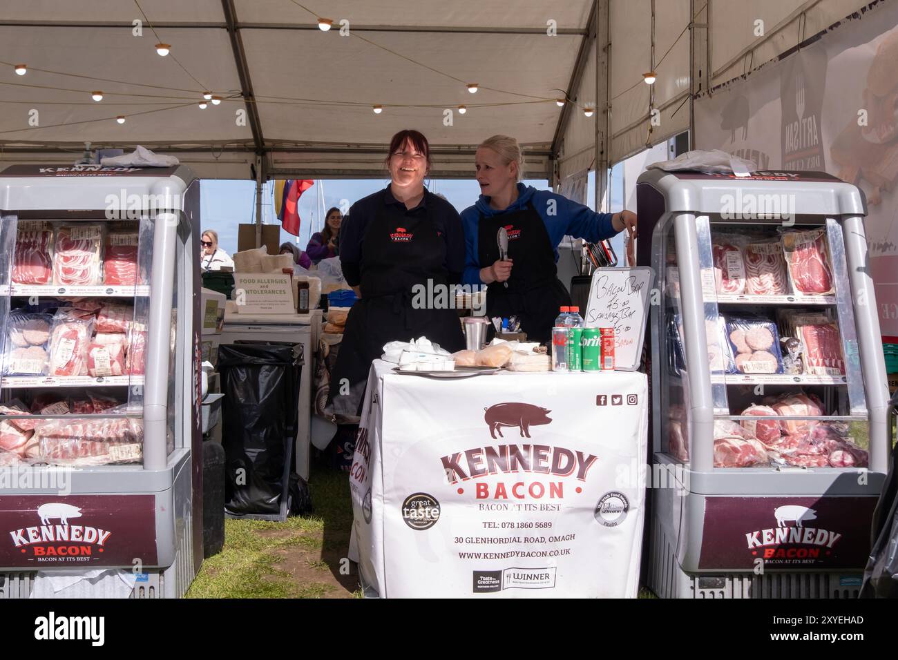 Kennedy Bacon fresh meat market stall at seafront selling local produce ...