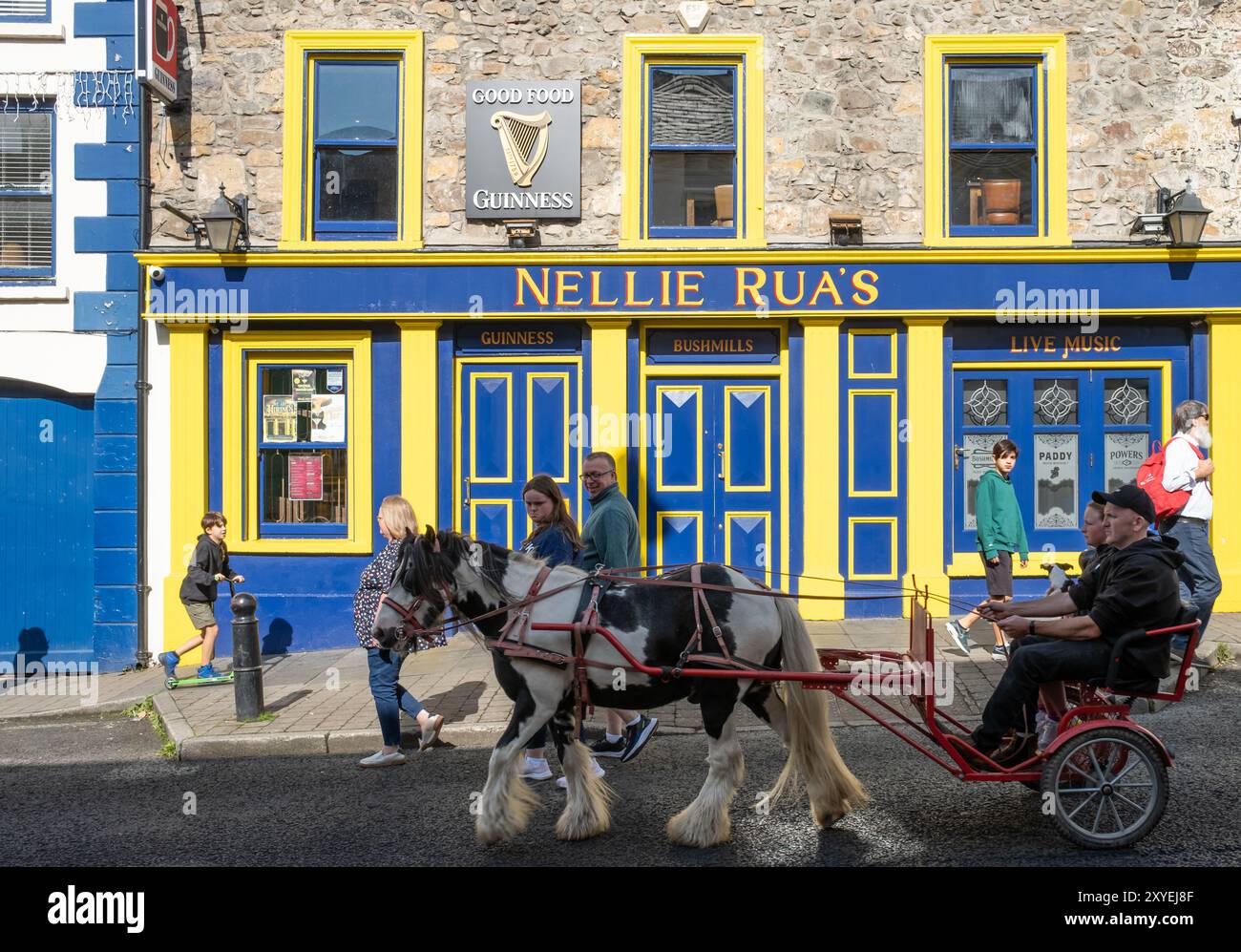 Frontage blue and yellow at Nellie Rua's bar in town centre, a small ...