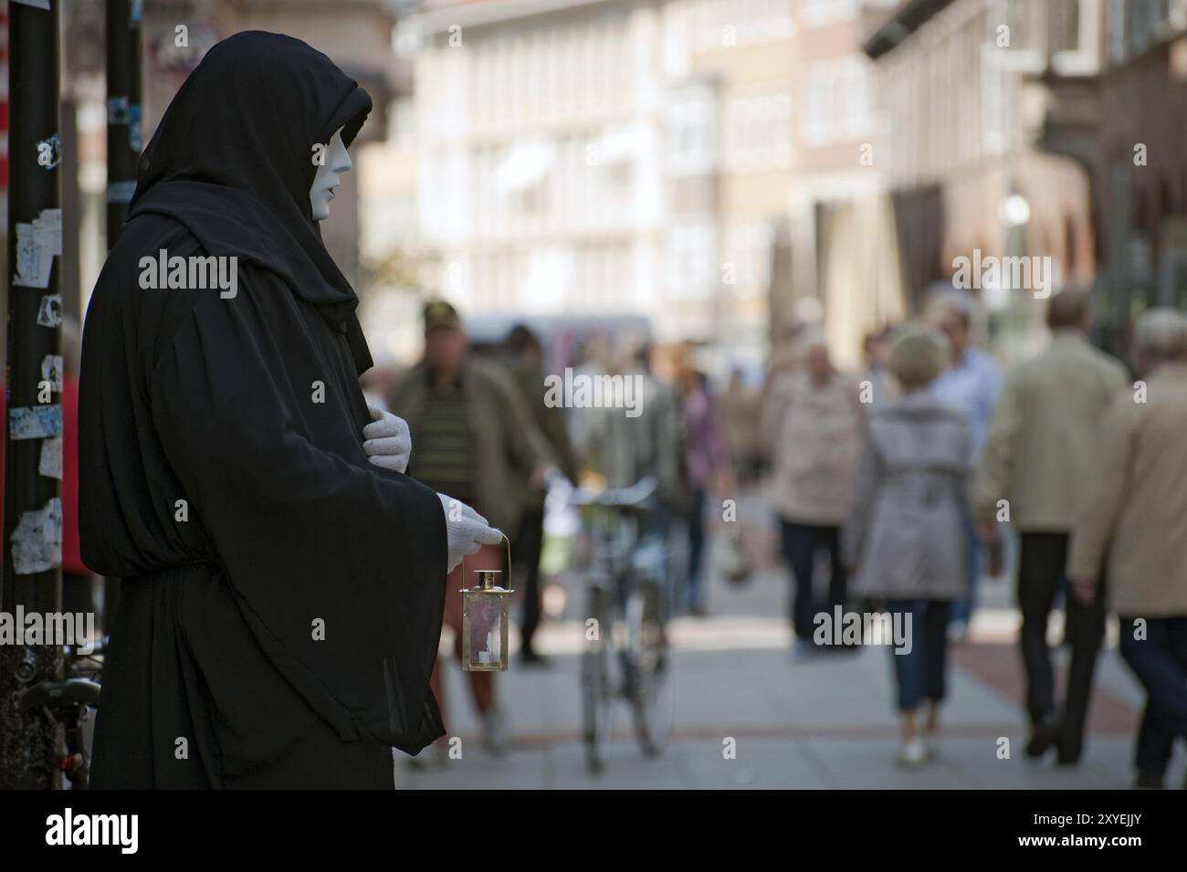 Begging monk in a pedestrian zone Stock Photo - Alamy