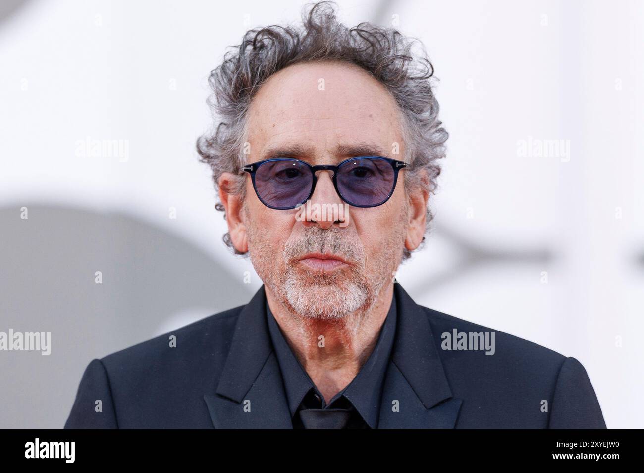 Director Tim Burton poses for photographers upon arrival for the ...