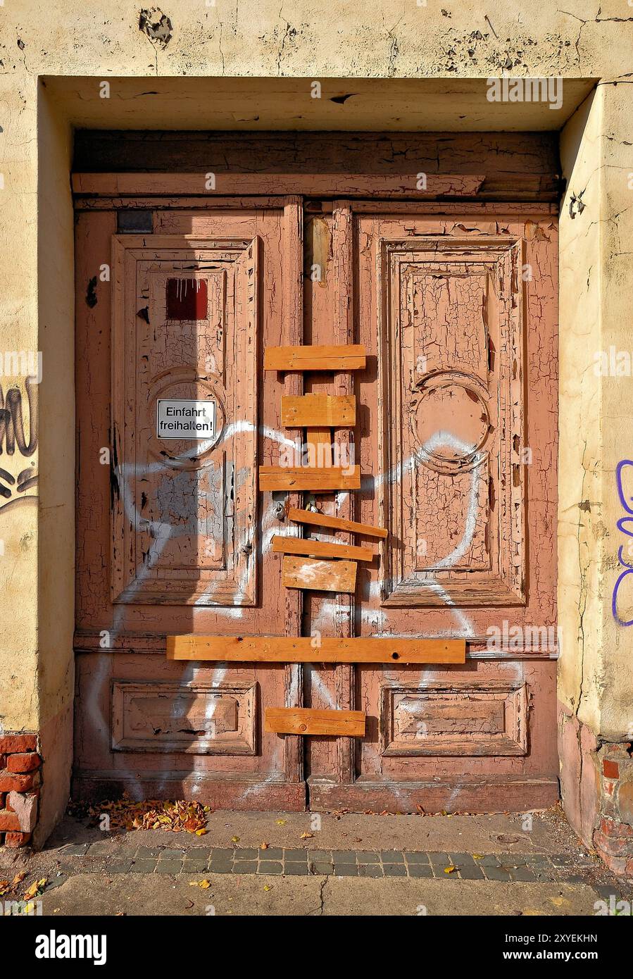 Entrance door of a vacant house in Magdeburg Stock Photo - Alamy