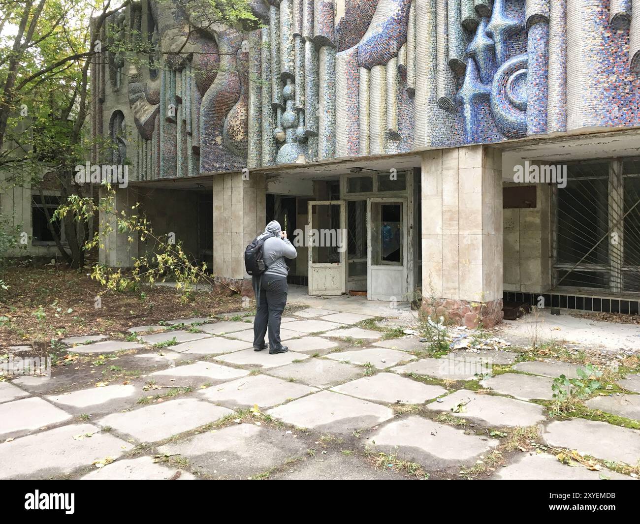 Town of Pripyat, Ukraine. A tourist is taking a picture of the ...