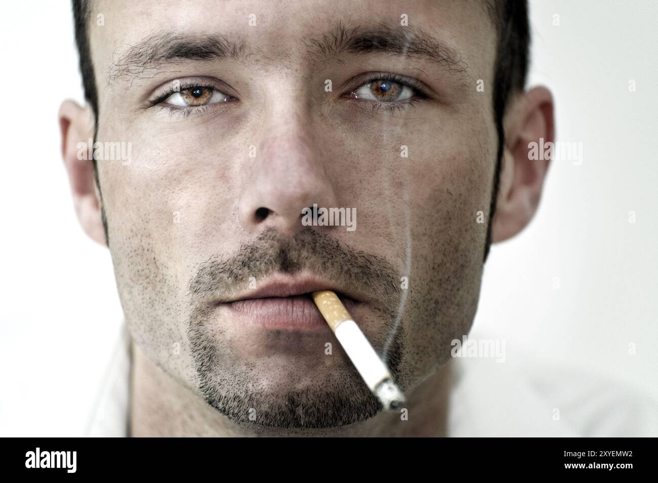 Mans face smoking hi-res stock photography and images - Alamy