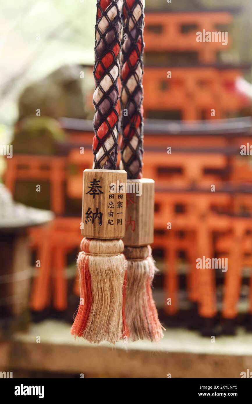Rope of a Suzu, Japanese Shinto shrine bell with Offering written on it ...