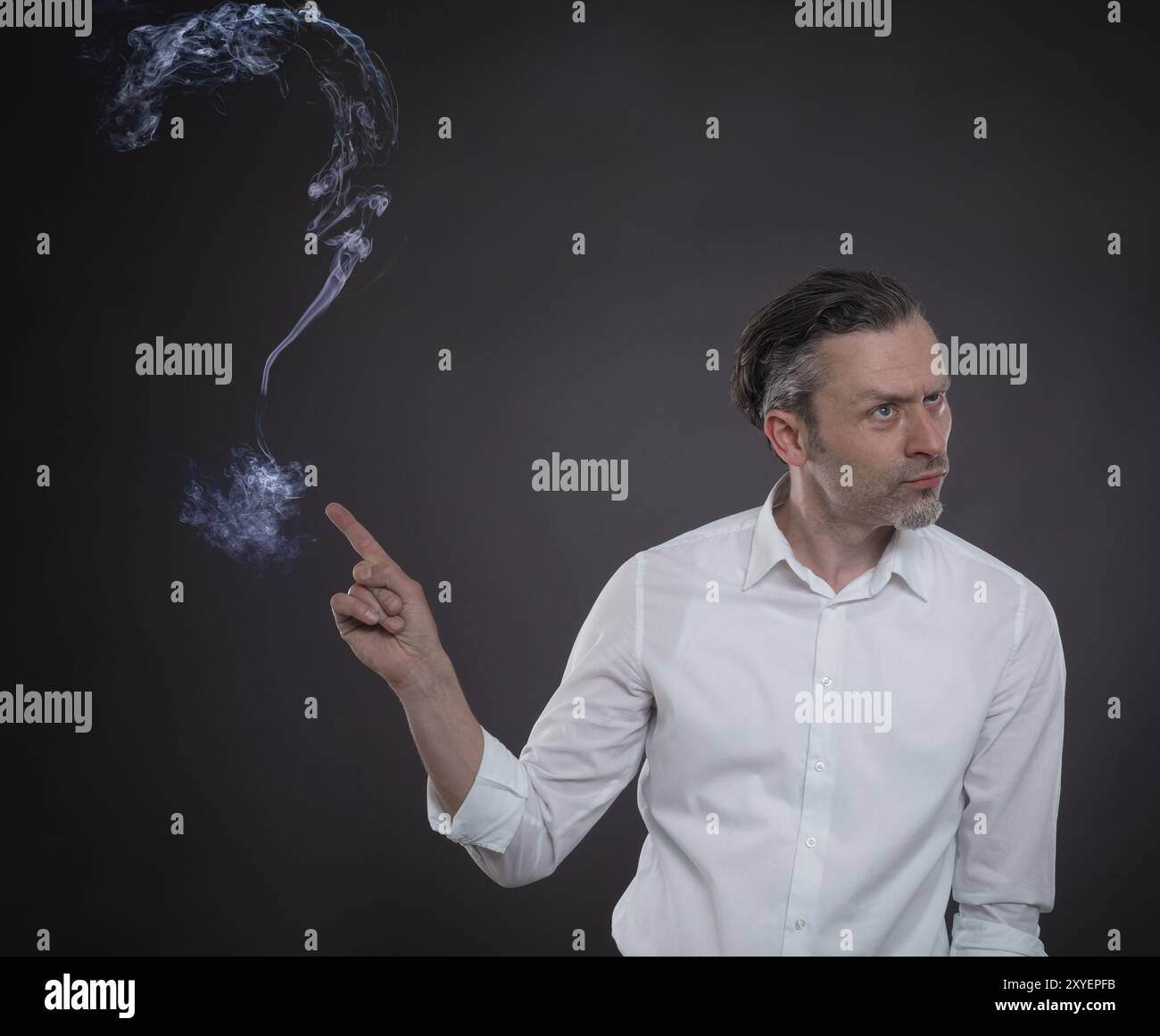 Business man with a big question mark of steam on a dark background ...
