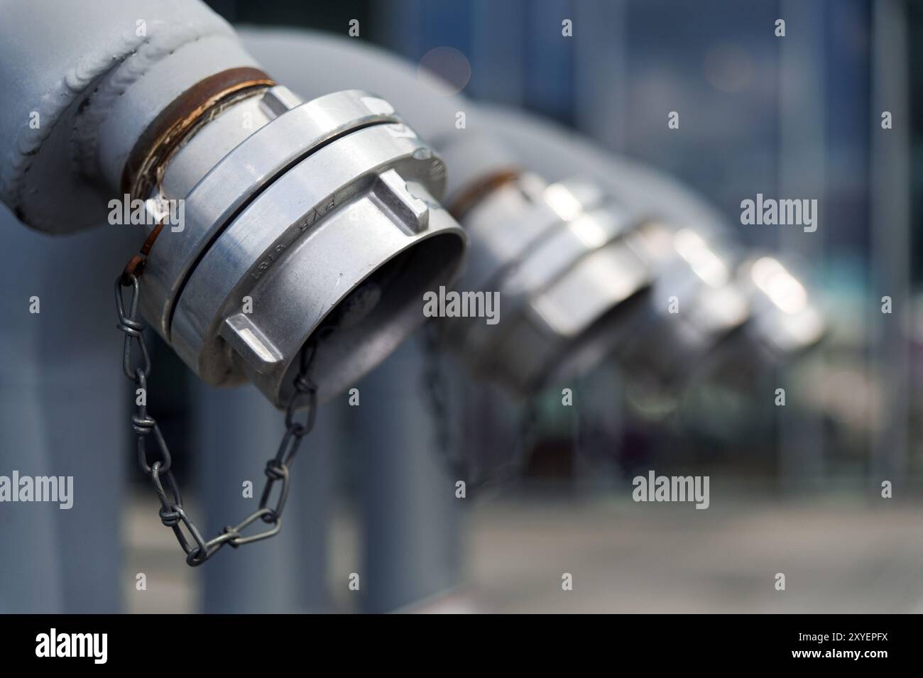 4 water connections in series next to each other Stock Photo - Alamy