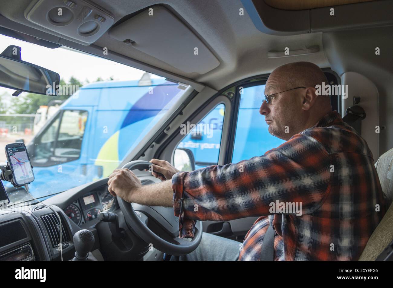 Driver of a motorhome in road traffic Stock Photo - Alamy