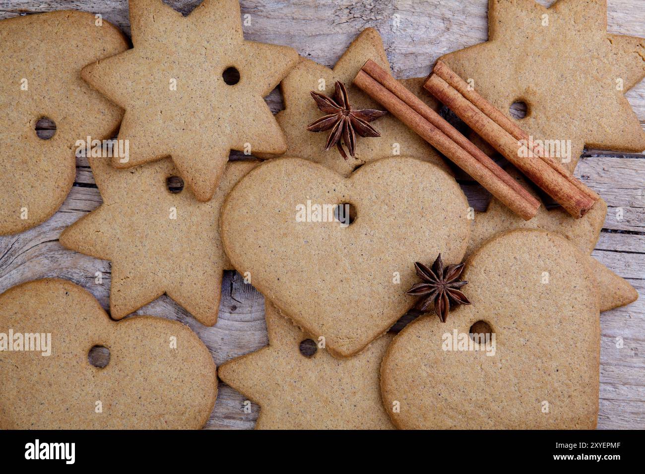 Small heart and star-shaped gingerbread with spices Stock Photo - Alamy