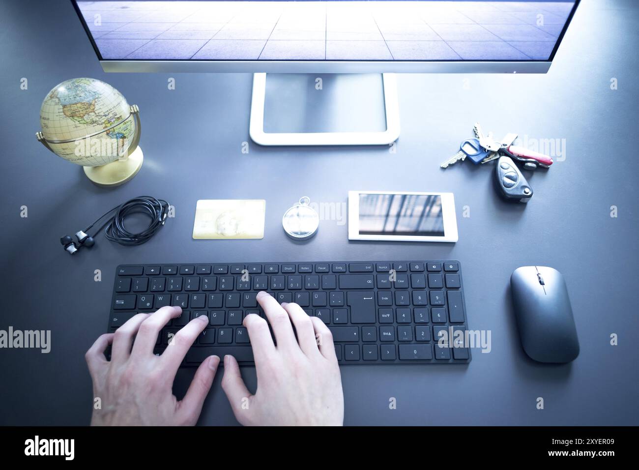 Workplace of a freelancer: Arrangement of computer, keyboard, credit ...