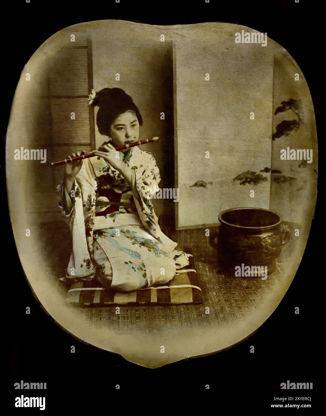 Uchiwa Fan - A woman playing a Kagurabue flute, 1900-1910 unknown photo ...