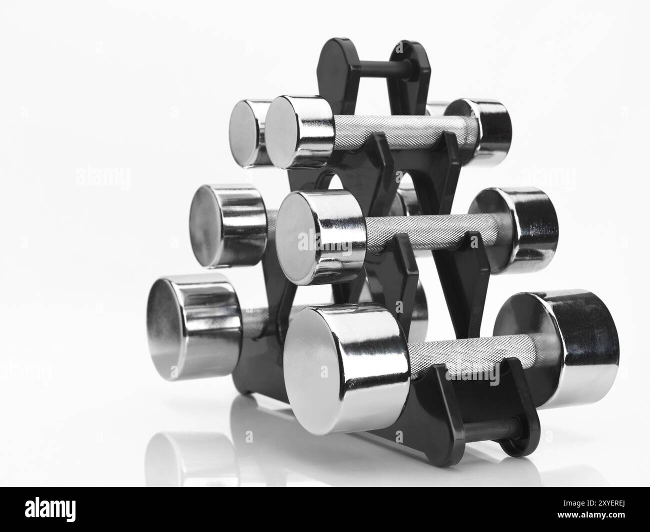 Shiny chrome dumbbells metal exercise weights isolated on white ...