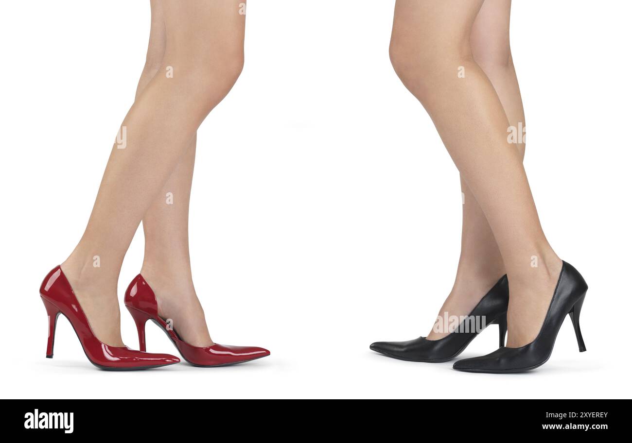 Two woman legs in high heel shoes isolated on white background Stock ...