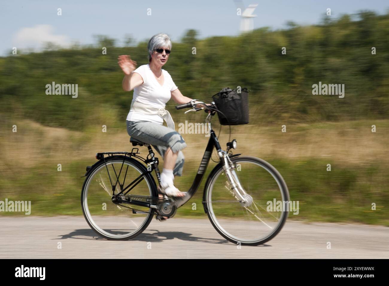 Woman, 50+, on a ladies' bike Stock Photo - Alamy