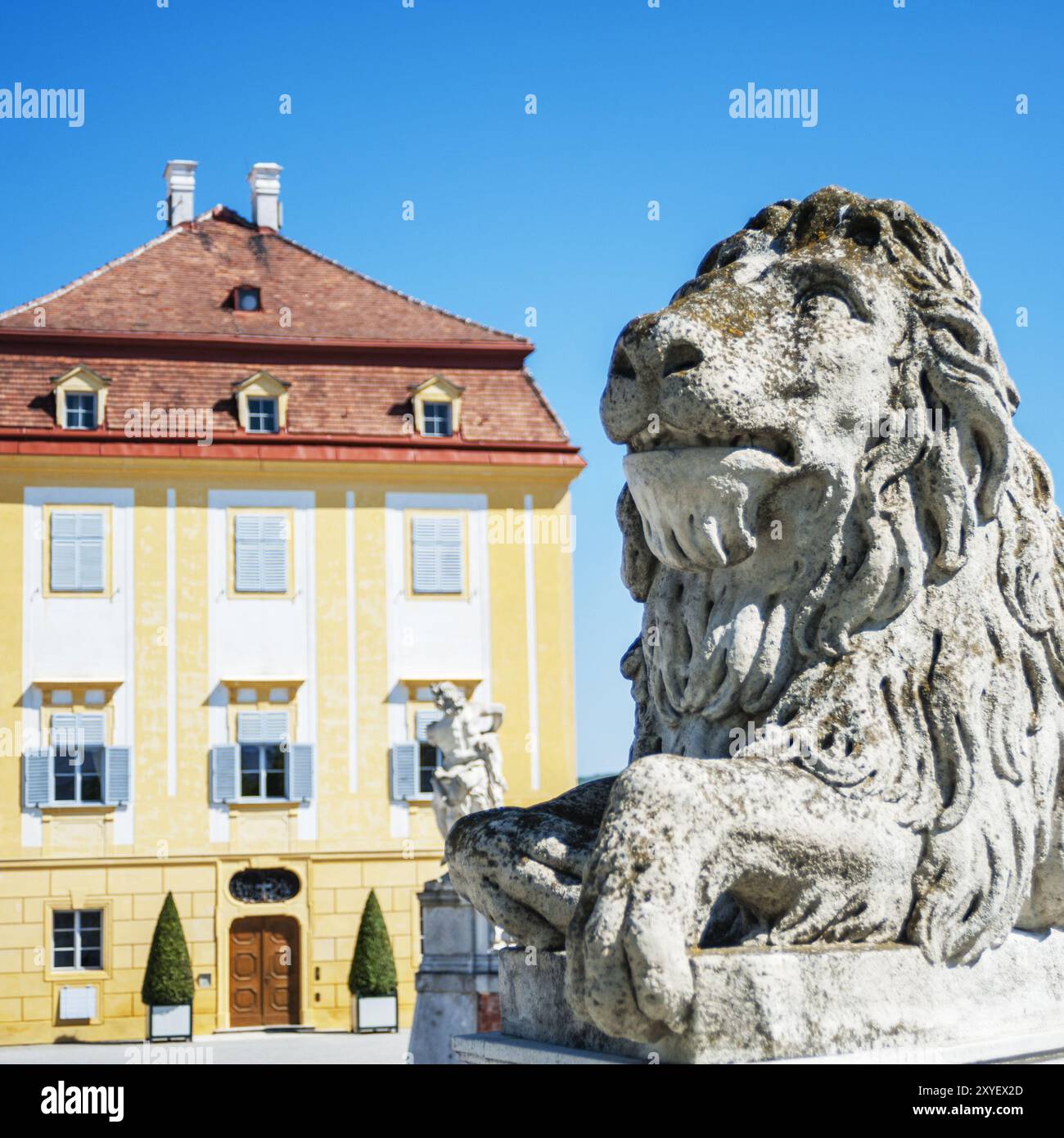 Statue of a friendly smiling lion Stock Photo - Alamy