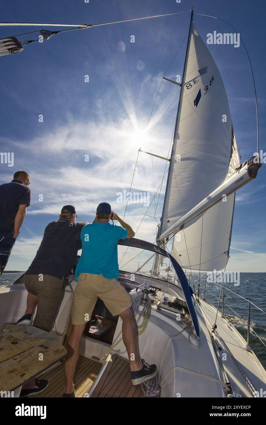 Silhouettes three people sailing on hi-res stock photography and images ...