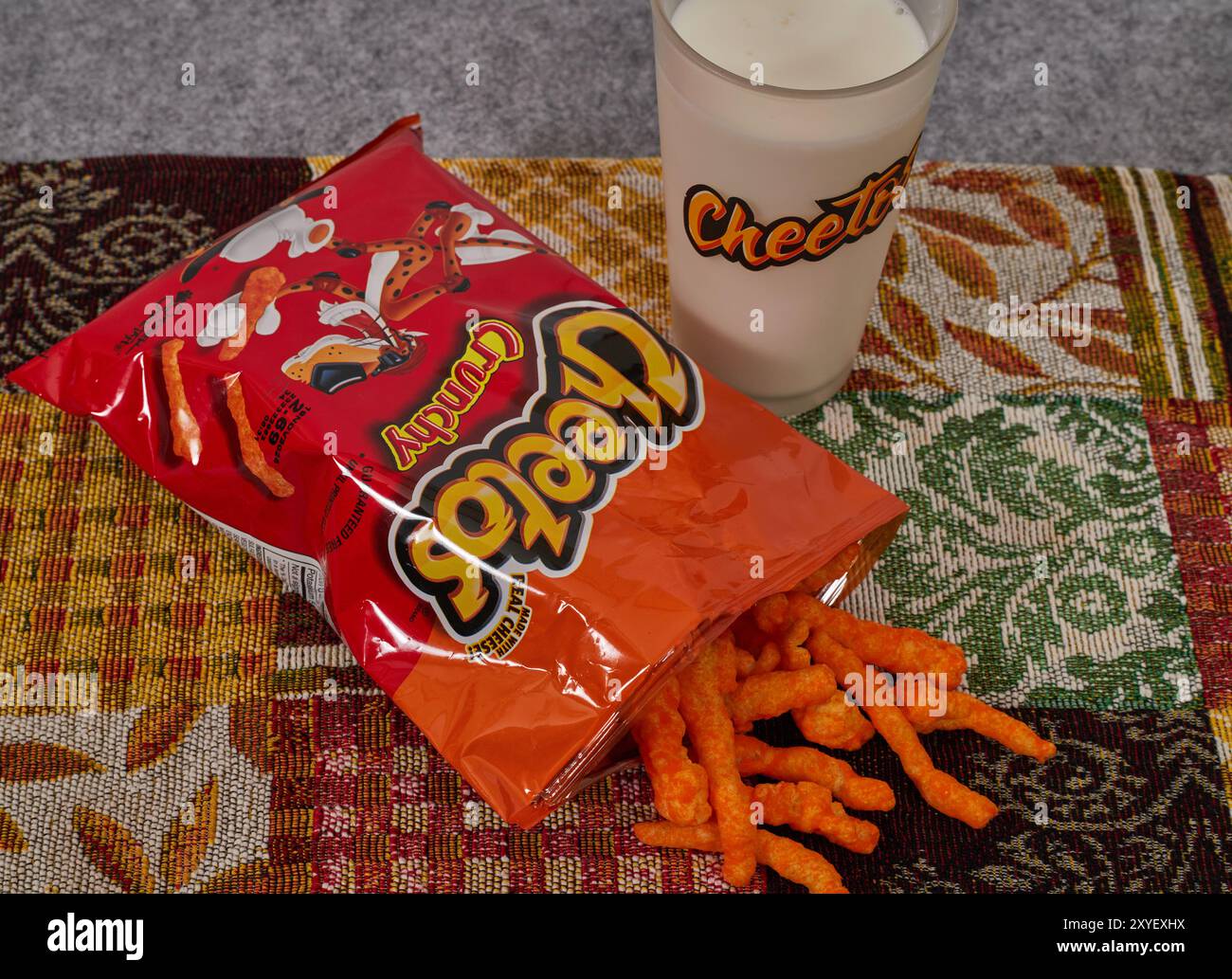 Cheetos crunchy with a glass of milk. Charles Elmer Doolin invented ...