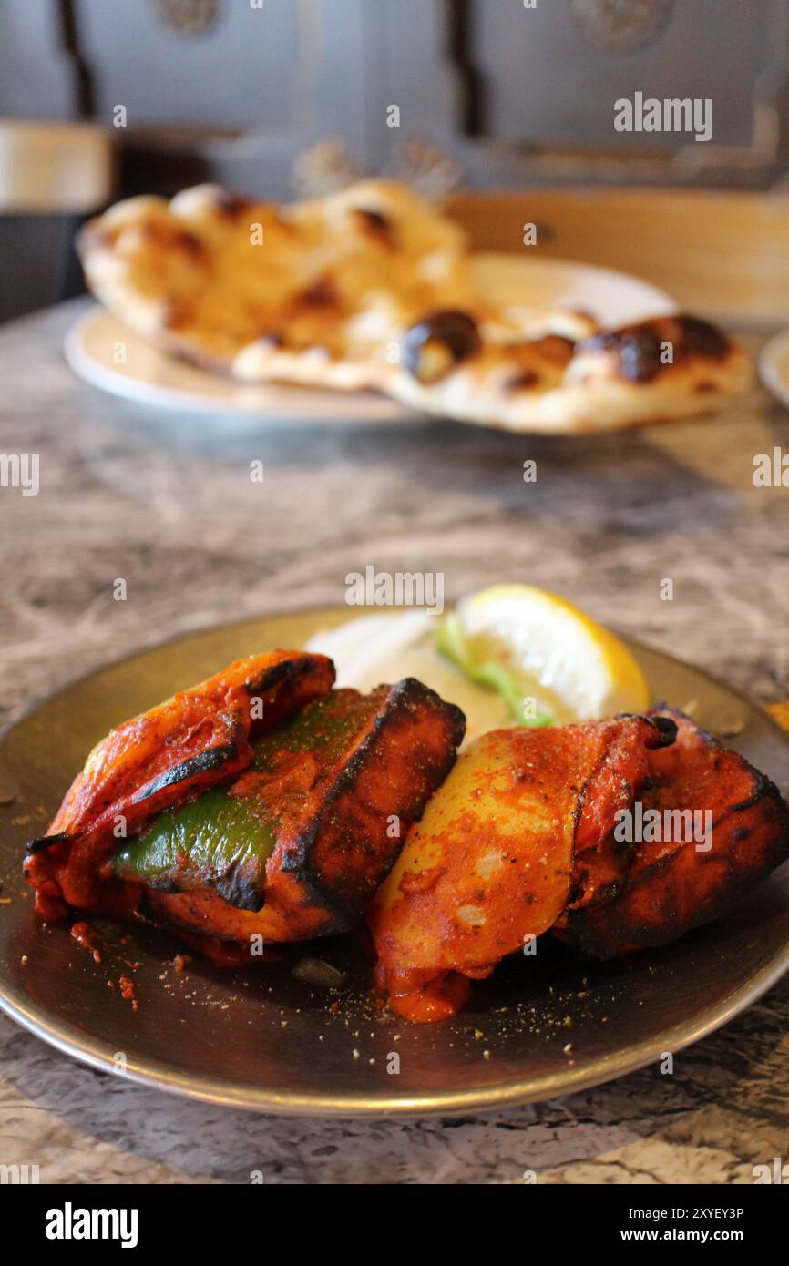 Indian cuisine: paneer tikka (fresh cheese spiced and grilled in ...