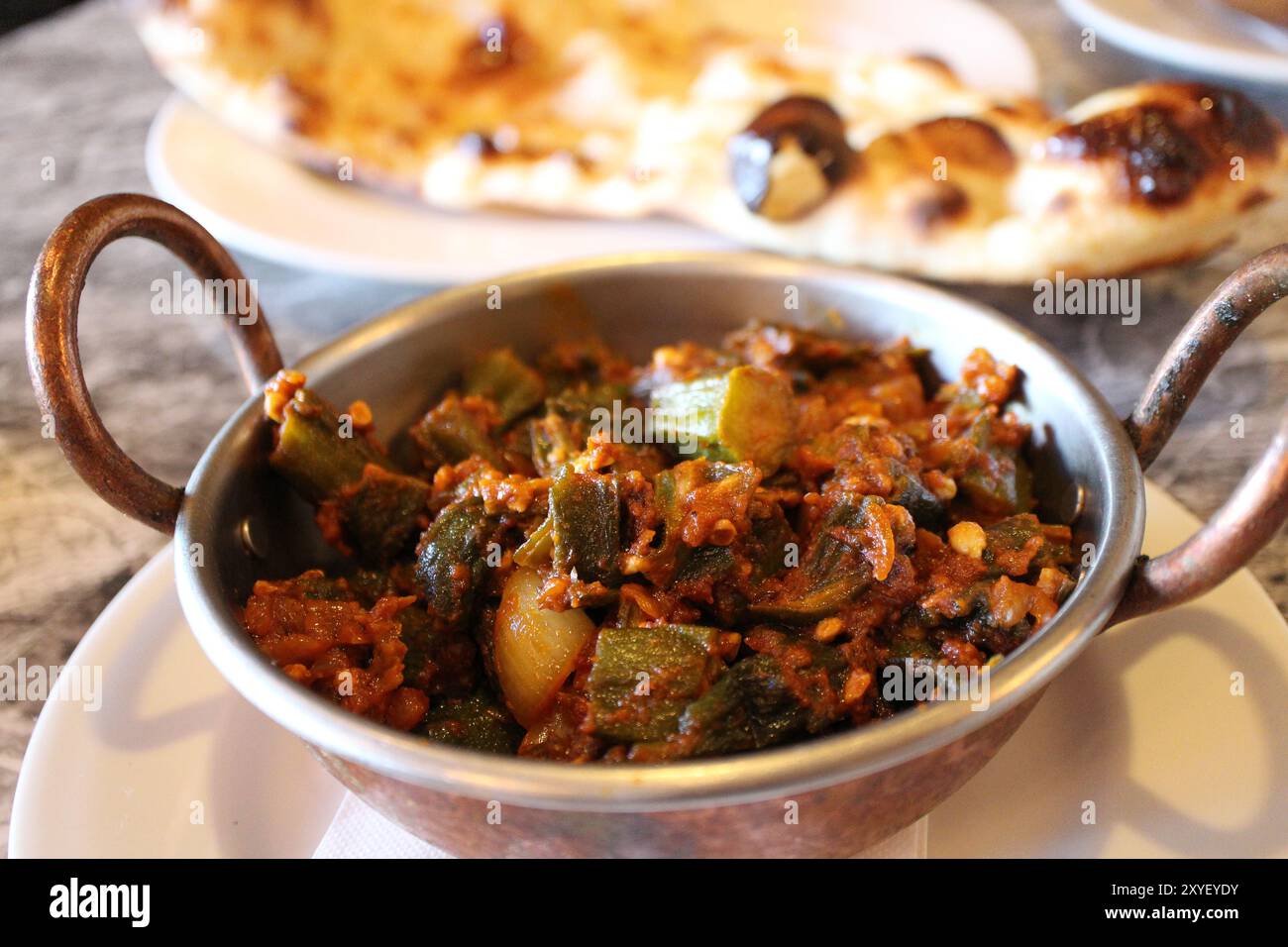 Indian cuisine: bhindi (okra) masala Stock Photo - Alamy