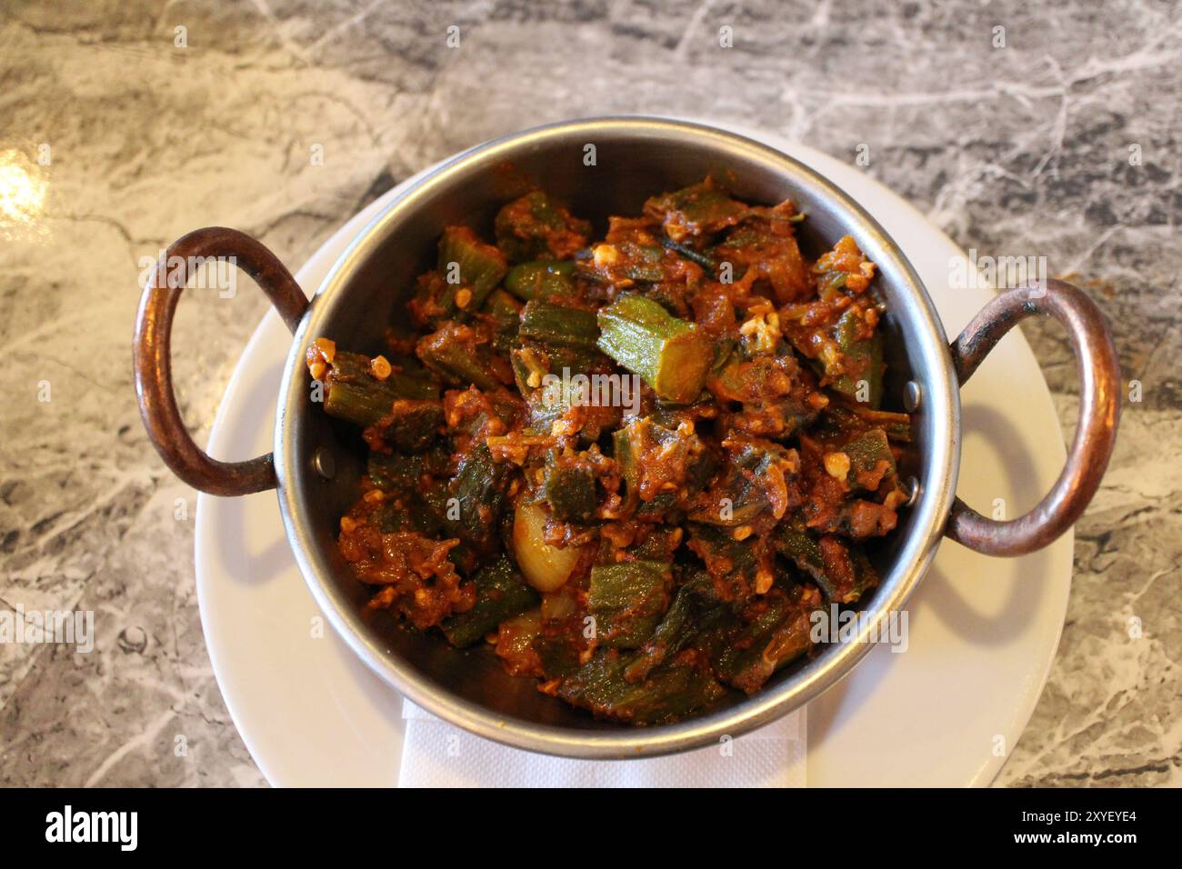 Indian cuisine: bhindi (okra) masala Stock Photo - Alamy