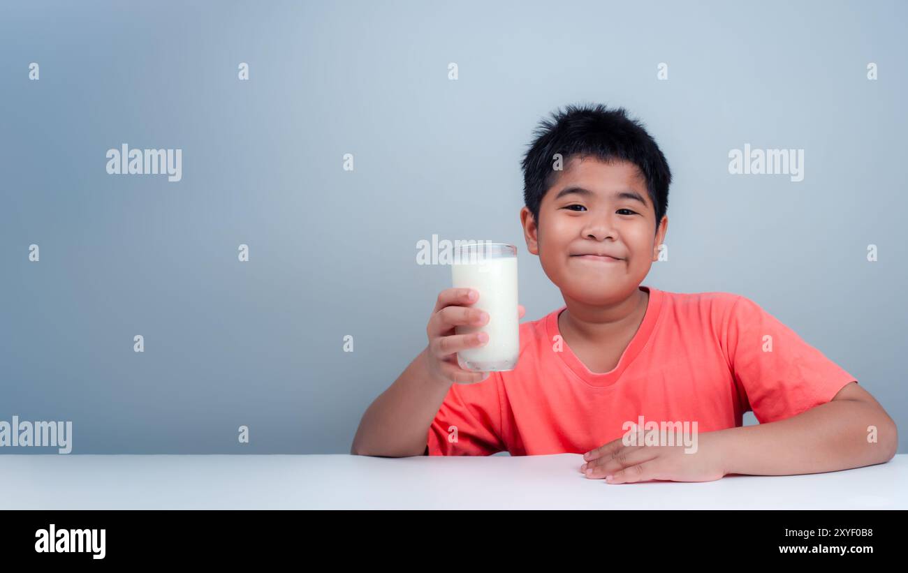 Concept of happy good nutrition, Portrait of a little young handsome ...