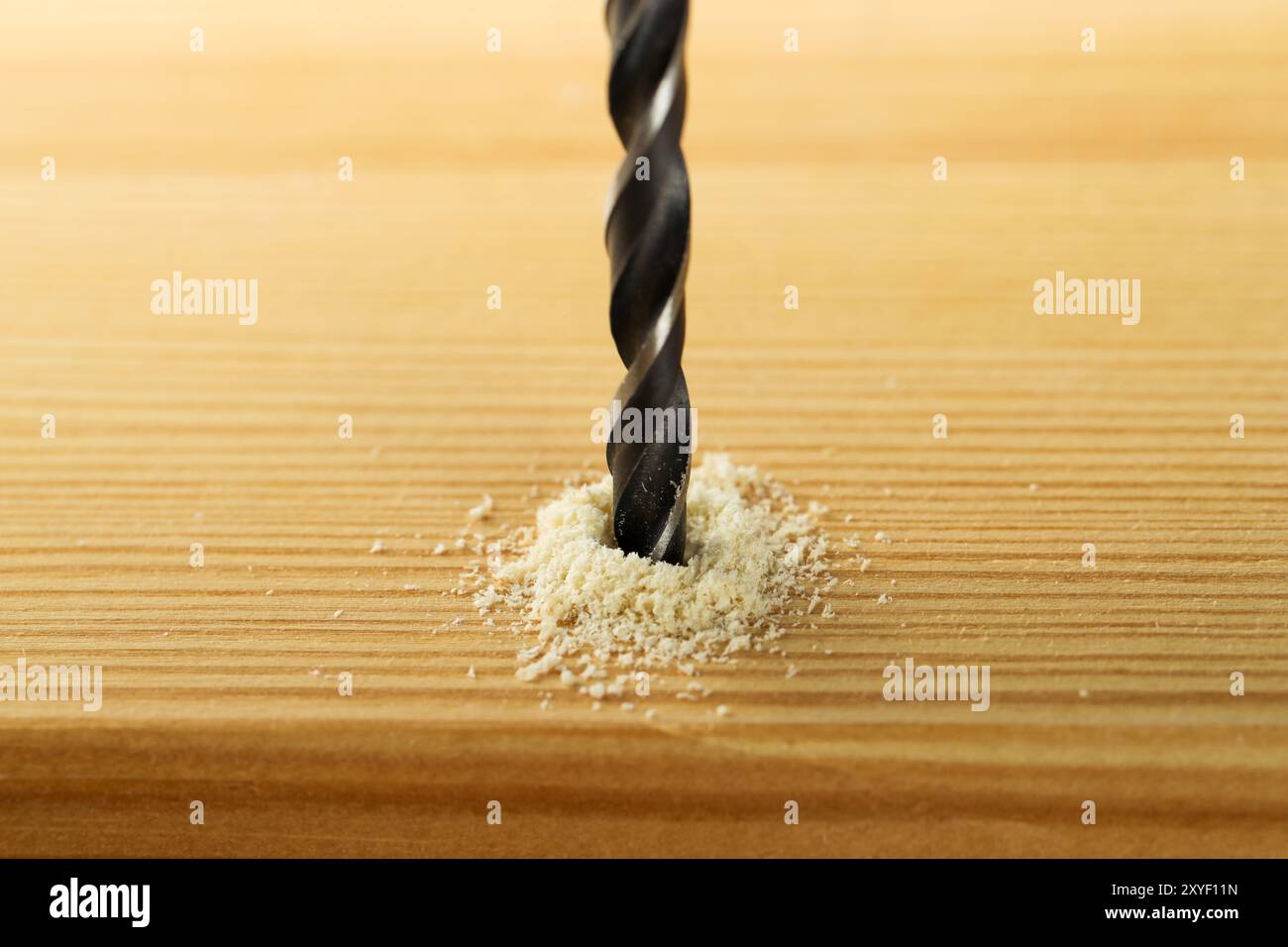 Drilling hole in wooden plank, closeup view Stock Photo - Alamy
